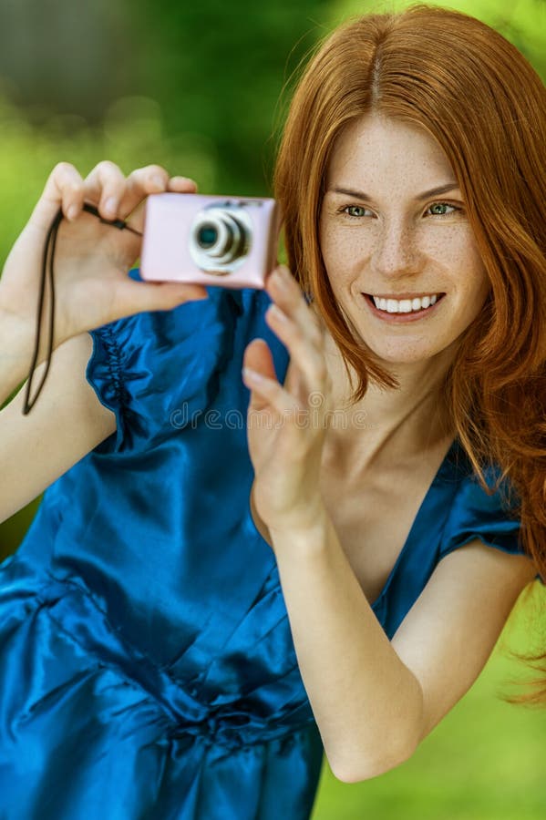 Young woman with camera stock photo. Image of leisure - 26316140