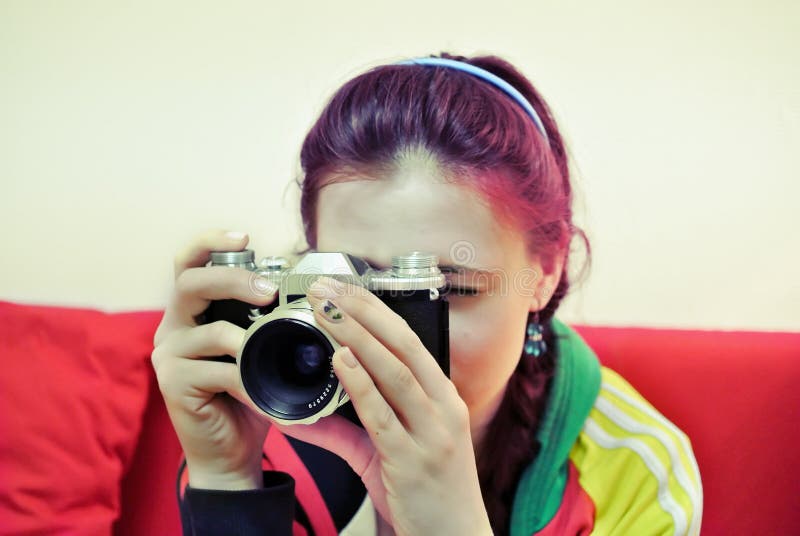 Young woman with camera stock image. Image of girl, model - 48501557