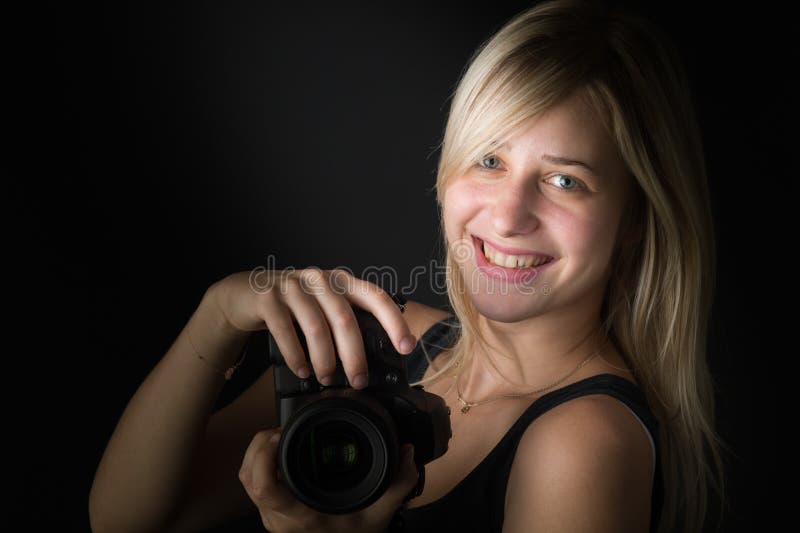 Young woman with camera stock photo. Image of lady, photographic - 64639110