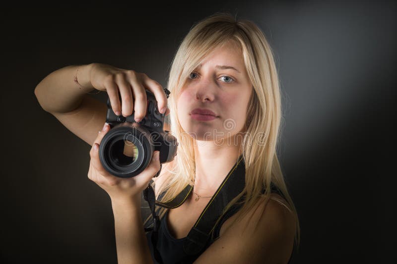 Young woman with camera stock image. Image of camera - 64639141