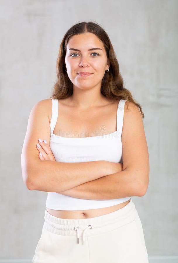 Young Woman in Casual Clothes Posing in Studio Stock Photo - Image of ...
