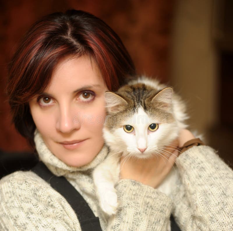 Young woman with a cat stock image. Image of feline, kitten - 27329541