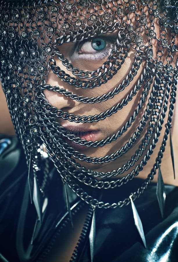 Young Woman with Chain Mask Stock Image - Image of looking, gold: 38845449