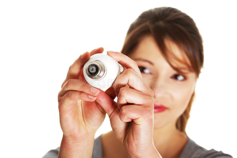 Young Woman Changing a Light Bulb Stock Photo - Image of concept, girl ...