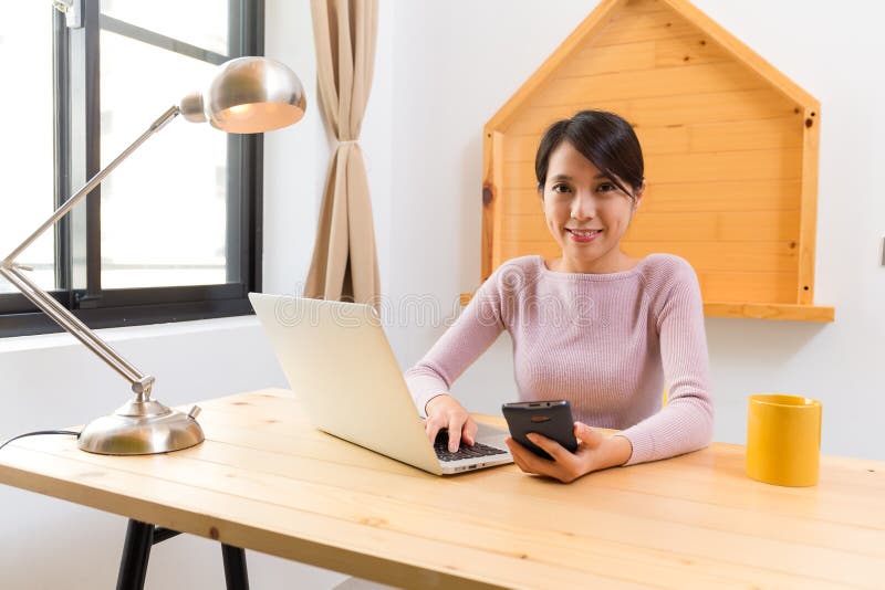 Young Woman Check Text Message when Using the Computer Stock Image ...