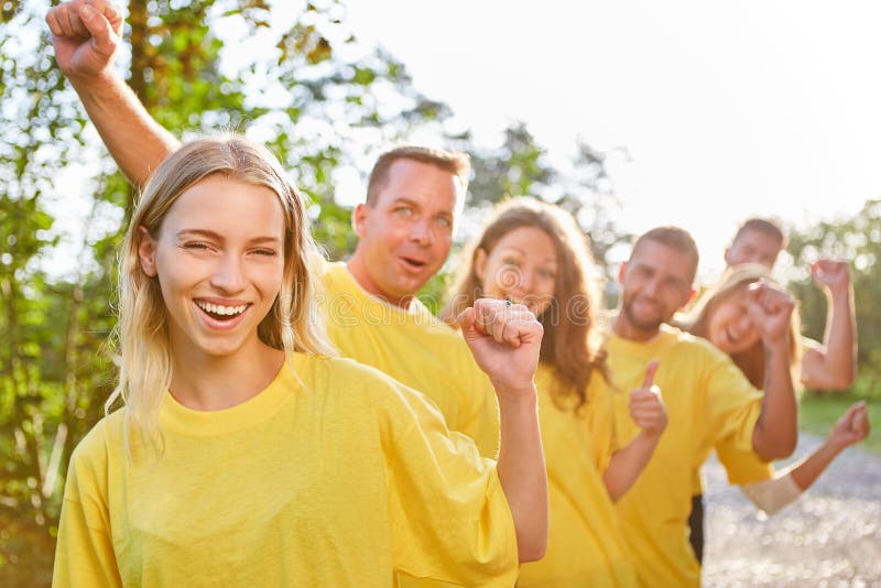 Young Woman Cheers with Her Team Stock Photo - Image of building, game ...