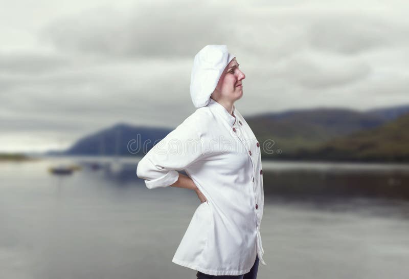 Young Woman Chef Has Back Pain. she is Suffer Stock Photo - Image of ...