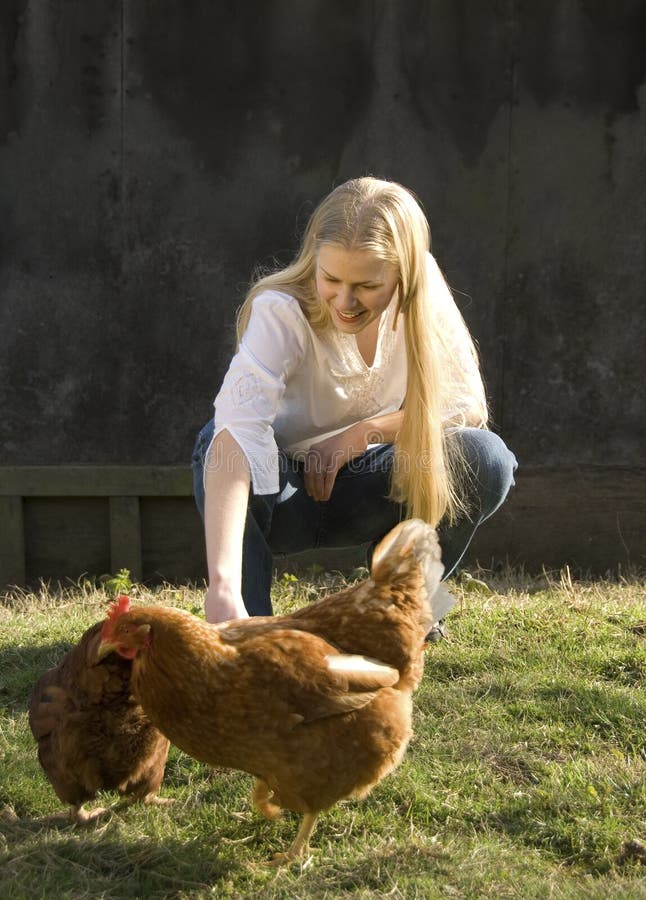 Young woman and chickens stock photo. Image of health - 2648124