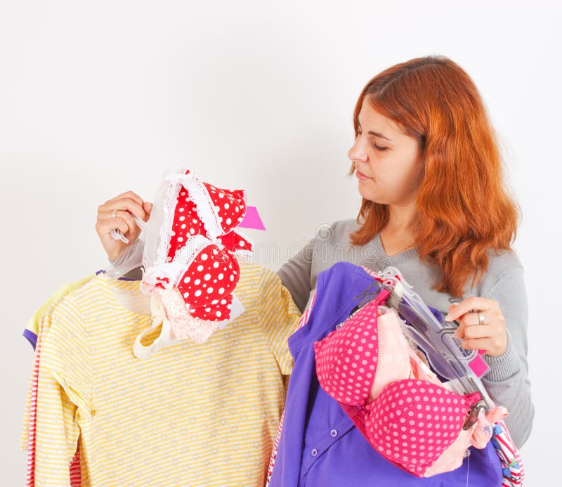 Young Woman Choosing Clothes Stock Image - Image of clothes, dress ...