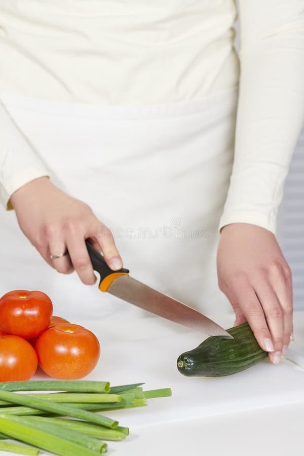 Young Woman Chop Vegetables Stock Photo - Image of home, cooking: 29639136