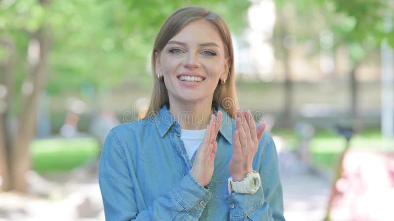 The Young Woman Clapping for Team Outdoor in Park Stock Video - Video ...