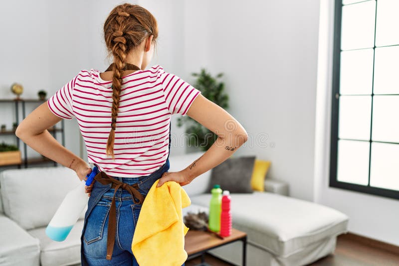 Young Woman Cleaner on Back View Standing at Home Stock Image - Image ...