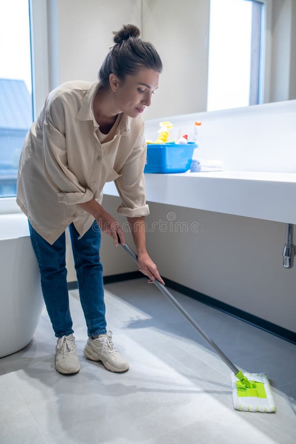 Young Woman Cleaning the Floor at Home Stock Image - Image of premices ...
