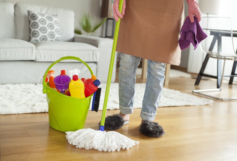 Young Woman Cleaning Floor in Room Stock Photo - Image of maid, cleans ...