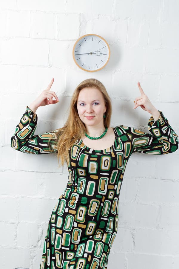 Young woman and clock stock image. Image of clock, dress - 25260951