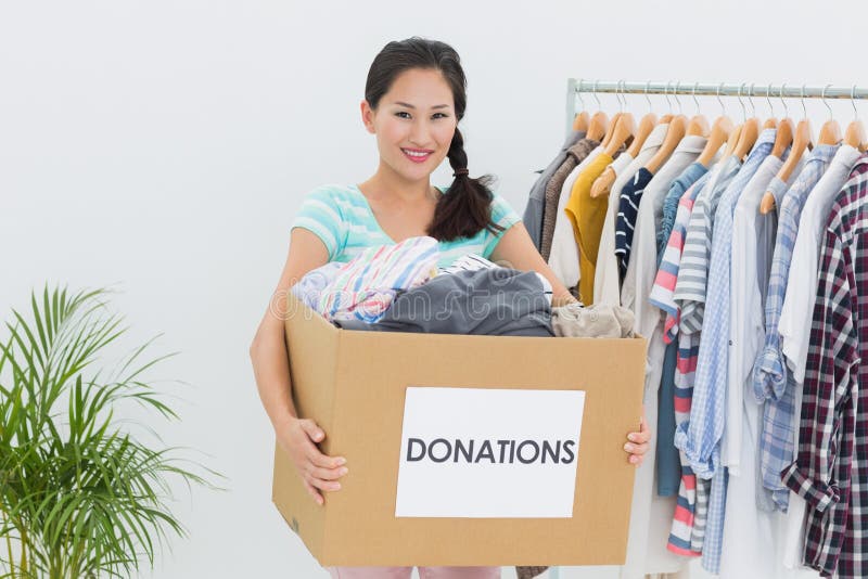 Young Woman with Clothes Donation Stock Photo - Image of asian ...
