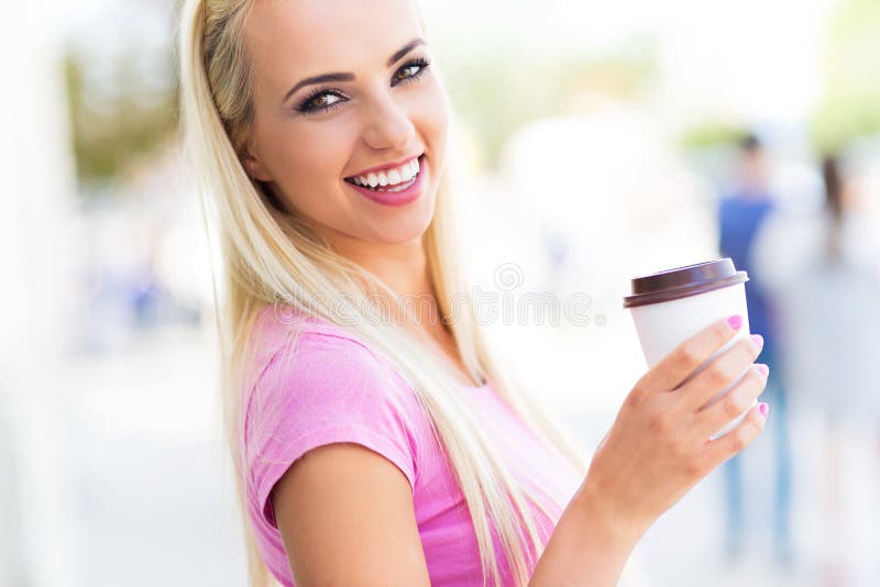Young Woman with Coffee To Go Stock Photo - Image of people, cell: 59798720