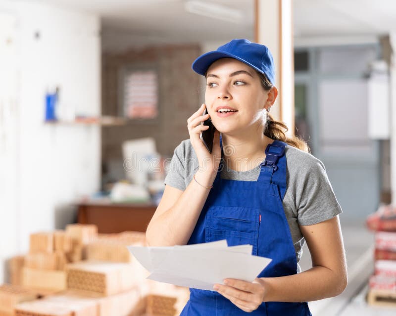 Young Woman Construction Worker Talking on Phone Stock Photo - Image of ...