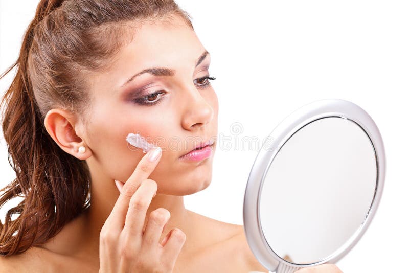 Young woman with cream stock image. Image of care, woman - 27339295