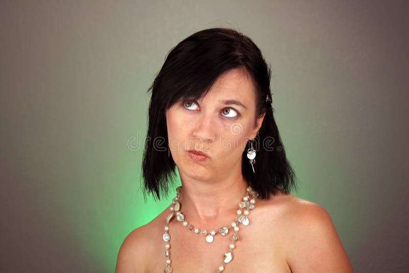 Young Woman with Curious Expression Stock Image - Image of headshot ...