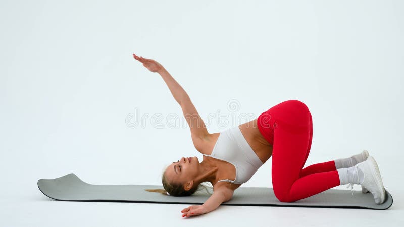 Young Woman Curling Up on a White Background. Stock Video - Video of ...