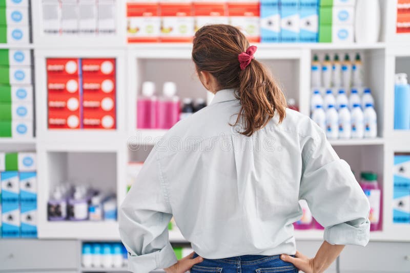 Young Woman Customer Standing on Back View at Pharmacy Stock Image ...