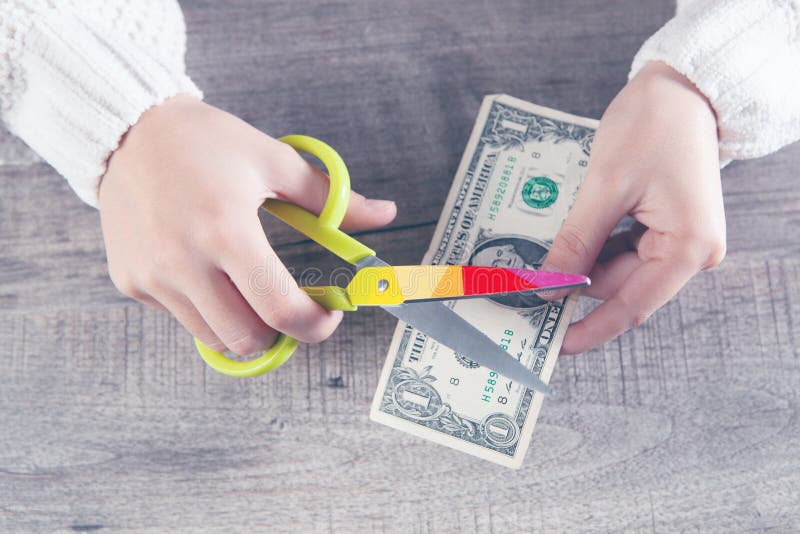 Young Woman Cuts Dollar Bill with Scissors Stock Image - Image of ...