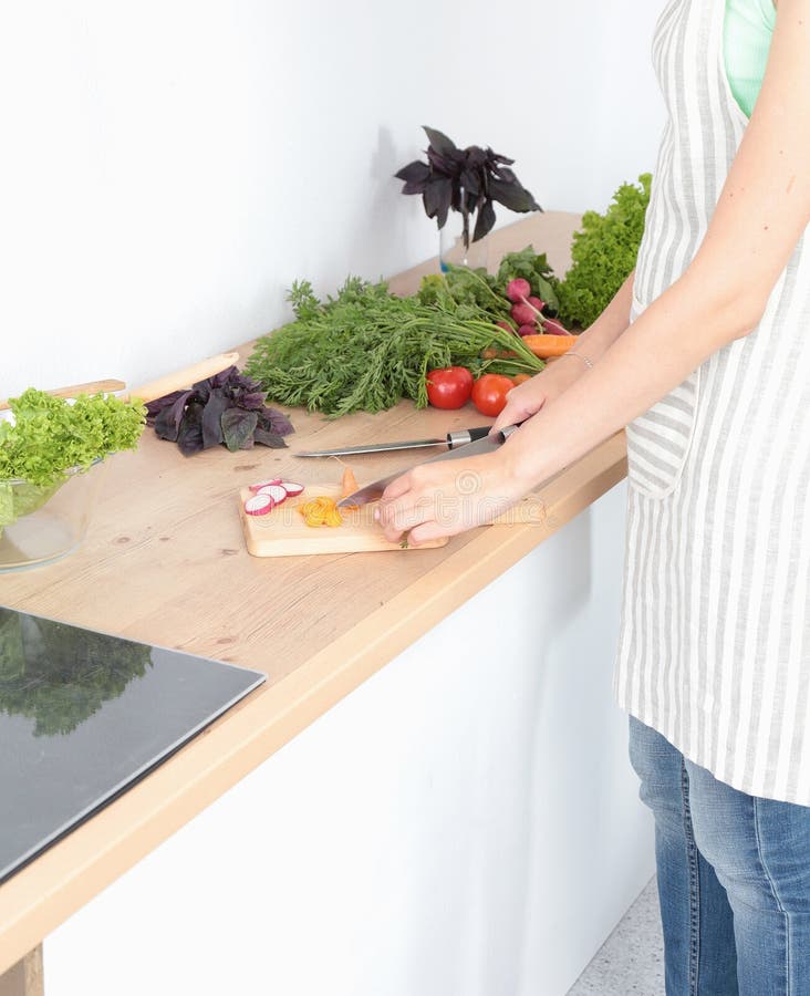 Young Woman Cutting Vegetables in the Kitchen Stock Image - Image of ...