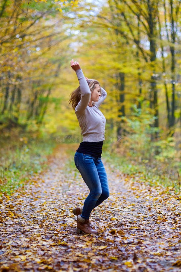 Young Woman Dancing in the Forest Stock Photo - Image of cheerful ...