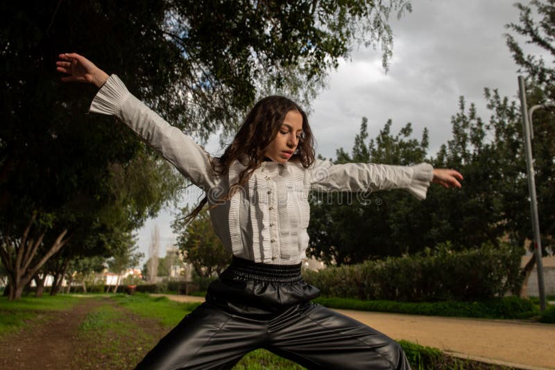 Young Woman Dancing Outdoors. Dance Performance in the Street Stock ...