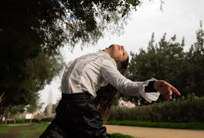 Young Woman Dancing Outdoors. Dance Performance in the Street Stock ...