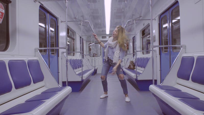 Young Woman Dancing in Subway Train Stock Footage - Video of gadget ...