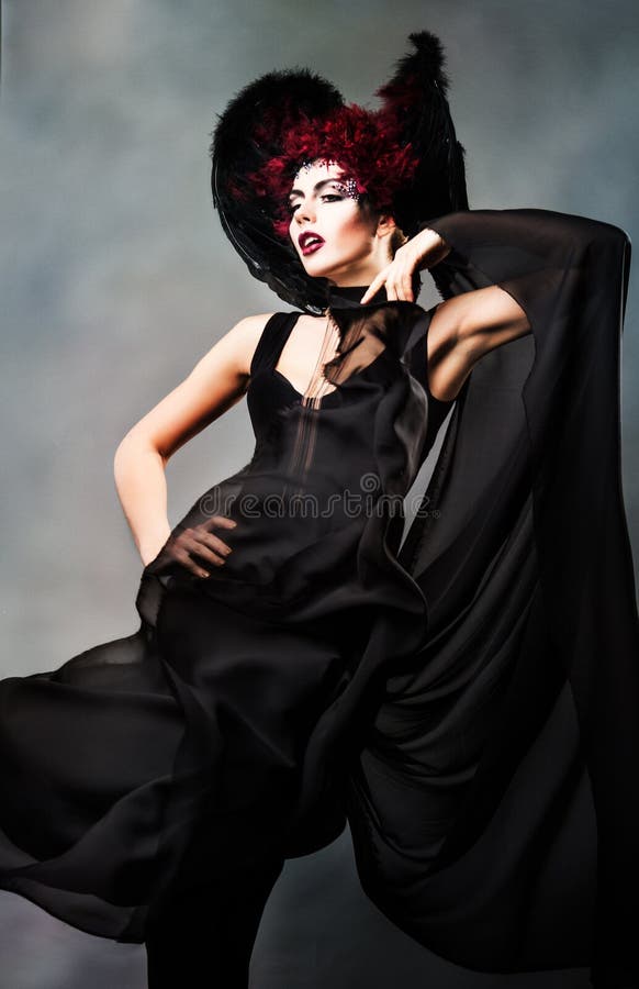 Young Woman with Demonic Look Stock Photo - Image of photomodel, dark ...