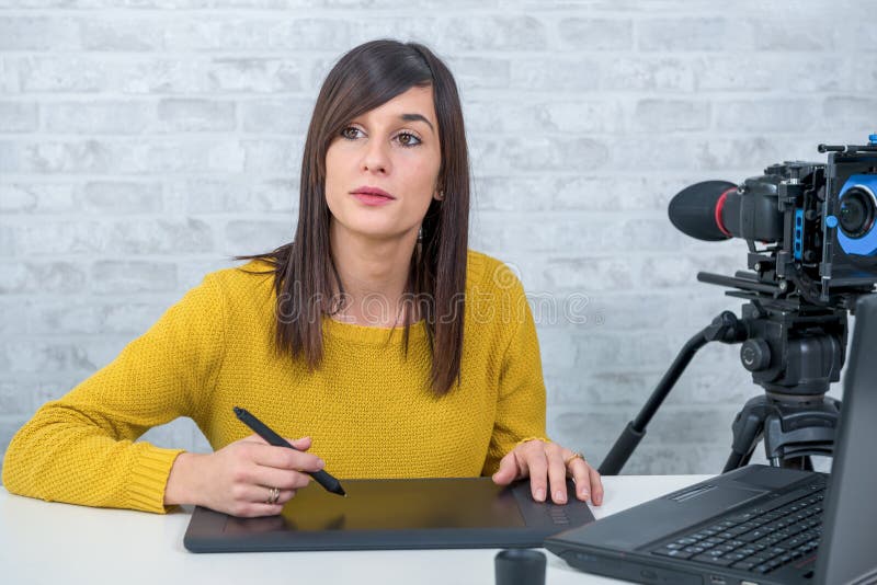 Young Woman Designer Using Graphics Tablet for Video Editing Stock ...