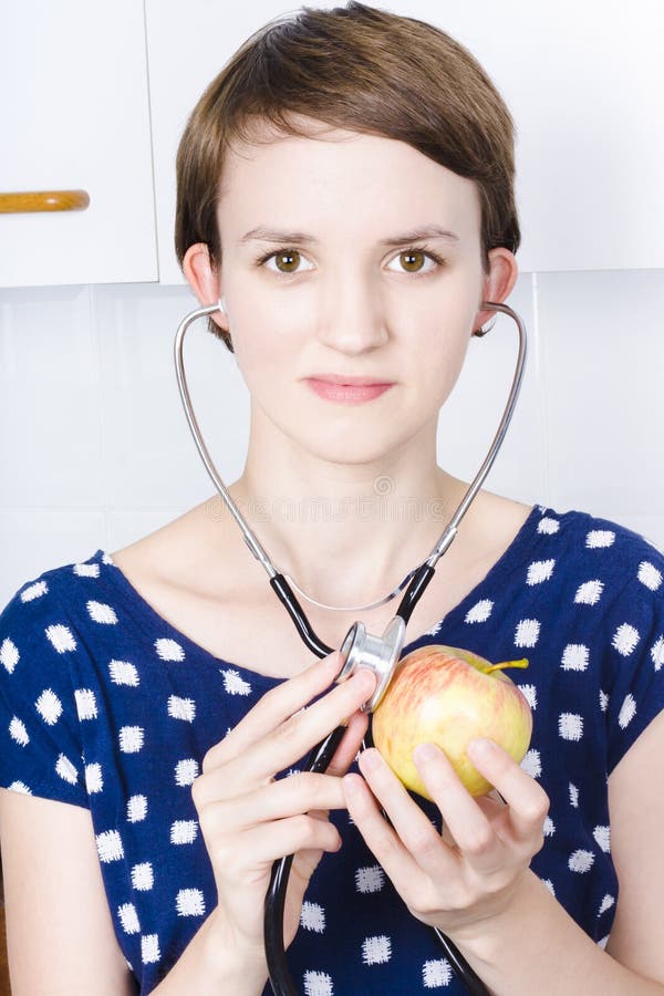 Young Woman Doctor With Apple Stock Image Image Of Pretty