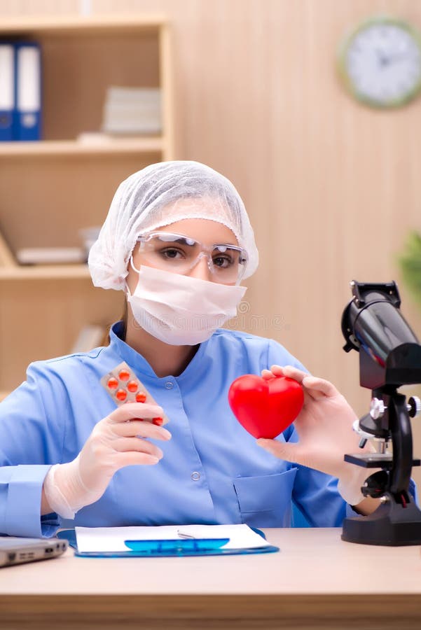 The Young Woman Doctor Working in the Lab Stock Image - Image of ...