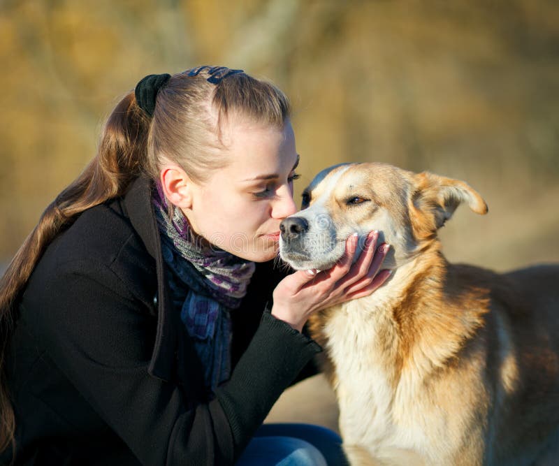 Young woman with dog stock image. Image of grass, behaviour - 19019617