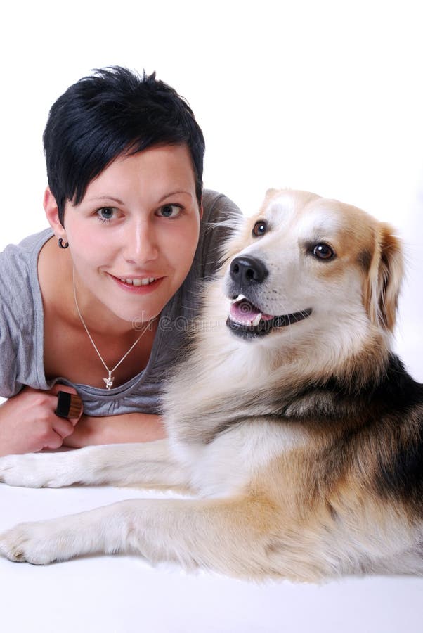 Young woman with dog stock image. Image of studio, proud - 20310949