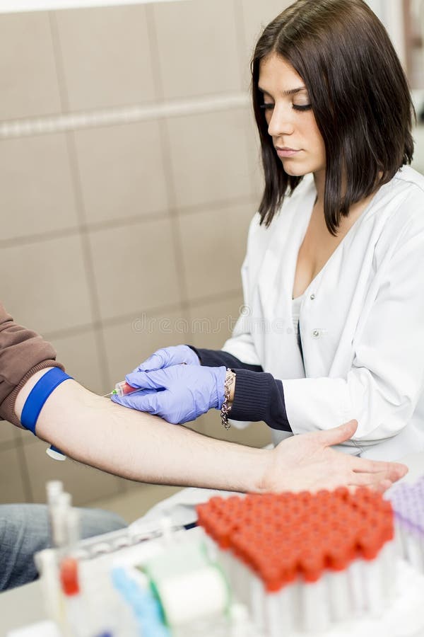Young Woman Doing Blood Sampling in Modern Medical Laboratory Stock ...