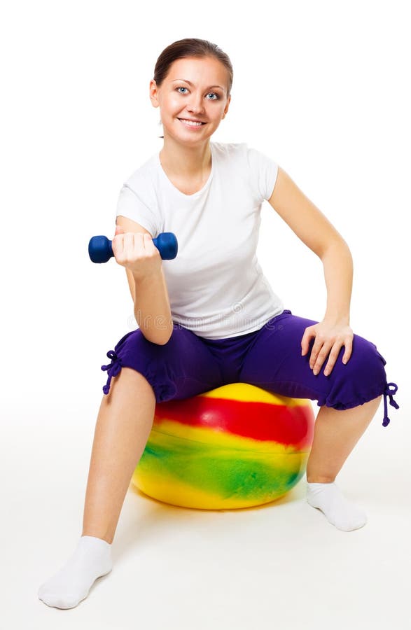 Young Woman Doing Exercises with Ball and Dumbell Stock Photo - Image ...