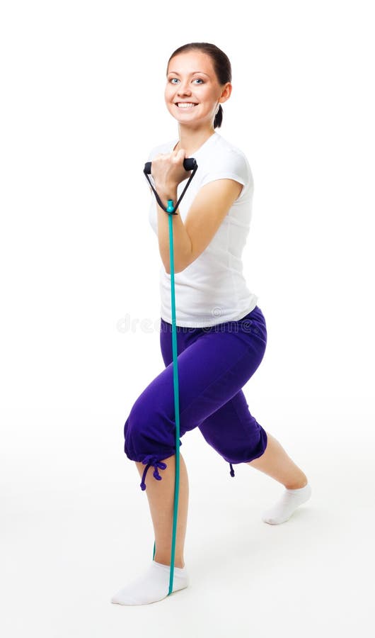 Young Woman Doing Exercises with Expander Stock Photo - Image of ...