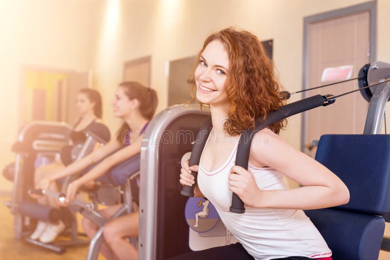 Young Woman Doing Exercises in Gym Stock Image - Image of action ...