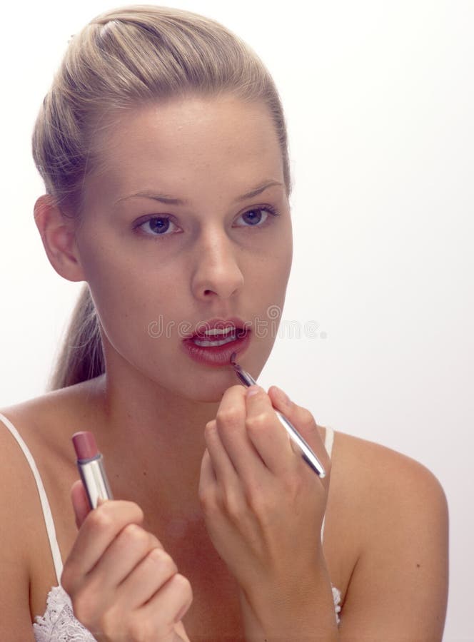 A Young Woman Doing Her Makeup Stock Image - Image of clean, grooming ...