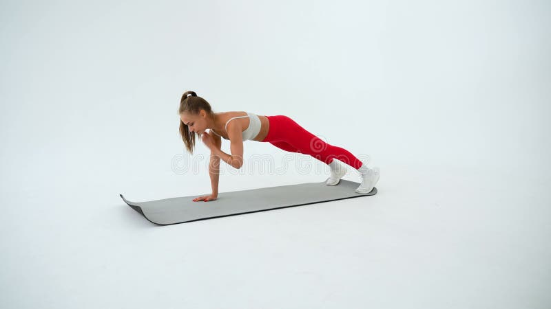 Young Woman Doing Plank Exercise on White Background. Stock Footage ...