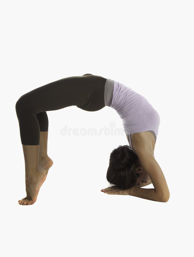 Young woman doing yoga stock photo. Image of limber, stretching - 24759820
