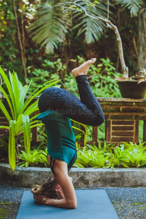 Young Woman Doing Yoga Outside in Natural Environment Stock Photo ...