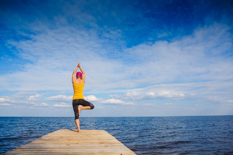 Young Woman Doing Yoga Pose Stock Photo - Image of color, happiness ...