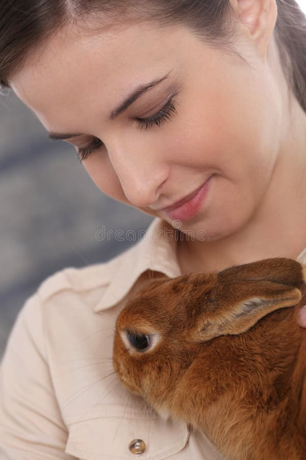 Young Woman with Domestic Rabbit Stock Photo - Image of ears, lifestyle ...