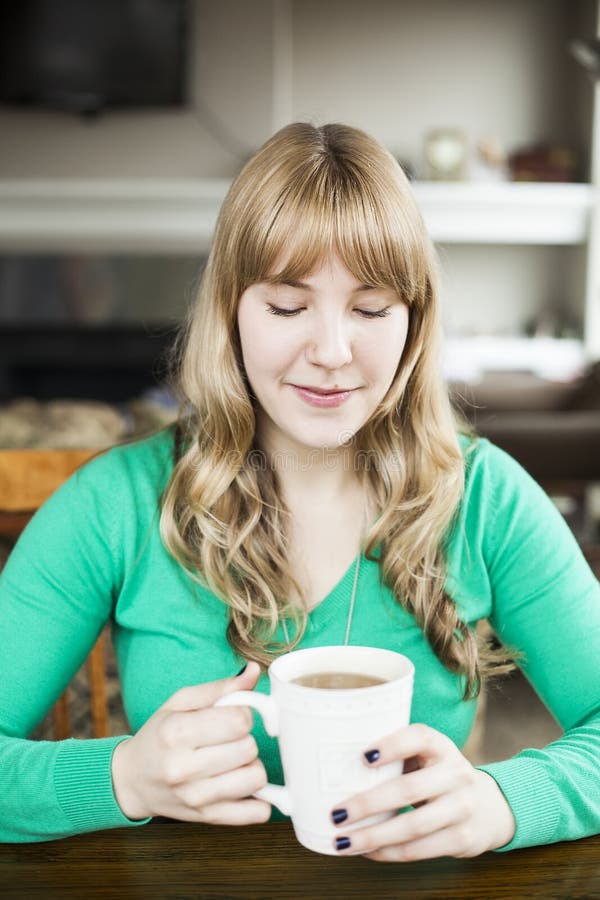 Young Woman Drinking Coffee Stock Image - Image of cafe, casual: 28817467