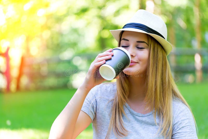 Young Woman Drinking Coffee Outside Stock Image - Image of lady ...